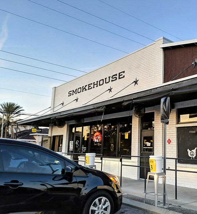 The white brick exterior of 4 Rivers Smokehouse stands like a temple to smoked meat, promising delicious salvation within those unassuming walls.