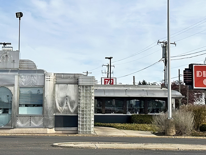 The gleaming stainless steel exterior of The Dining Car stands as a beacon of comfort food in Northeast Philly, promising delicious nostalgia inside.