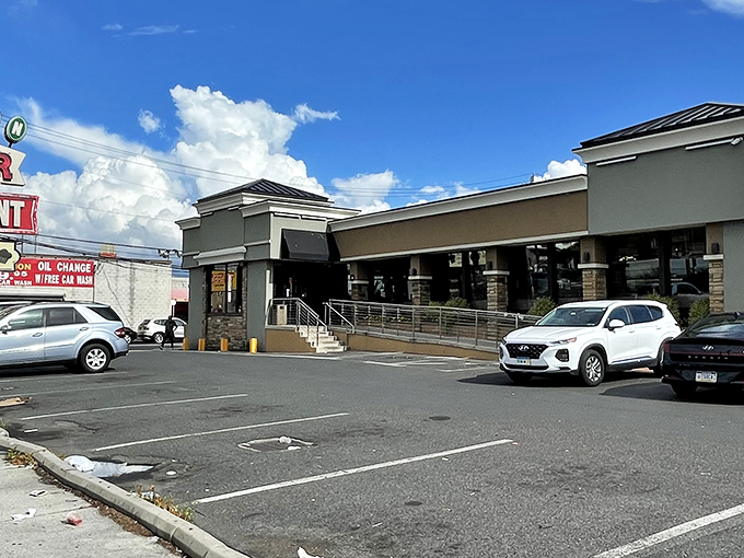 The Oregon Diner's exterior stands ready to welcome hungry Philadelphians, its inviting glow shining like a beacon of comfort food in South Philly.