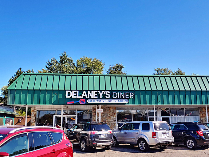 Delaney's Diner stands proudly with its signature green roof, like a beacon calling hungry breakfast enthusiasts from across Westerville.
