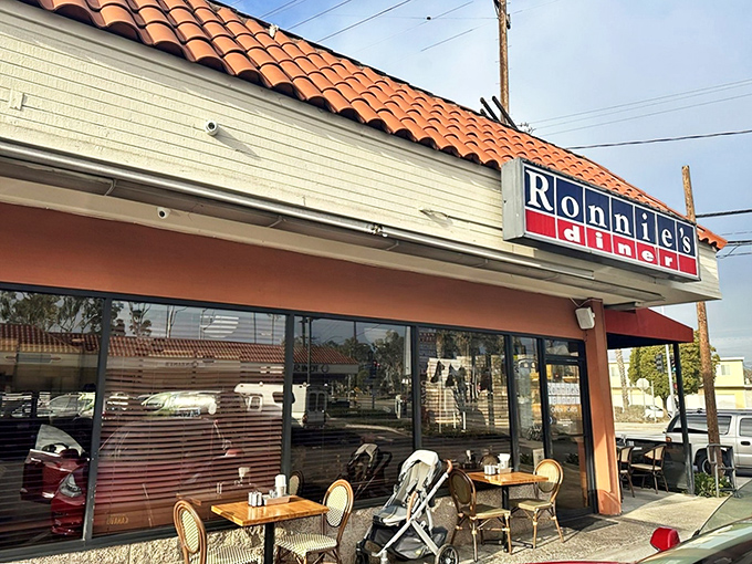 The Spanish-tiled roof and classic signage of Ronnie's Diner beckons like an old friend promising comfort in pancake form.