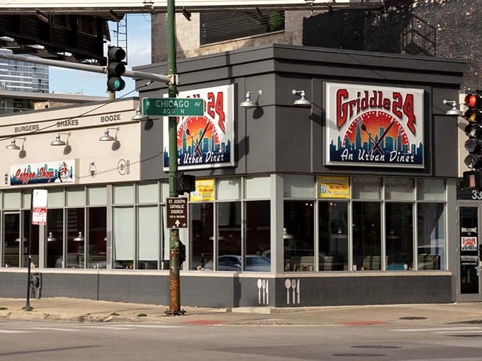 The navy blue awnings of Griddle 24 stand out on Chicago Avenue like a breakfast beacon, promising urban diner delights inside.
