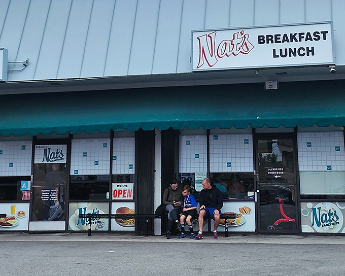 The unassuming storefront of Nat's Coffee Shop beckons with its retro charm and teal awning&mdash;proof that culinary treasures often hide in plain sight.