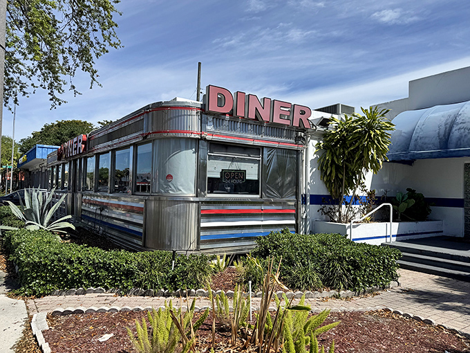 The gleaming silver exterior of Jack's Hollywood Diner shines like a beacon of breakfast hope, promising classic American comfort in a nostalgic package.