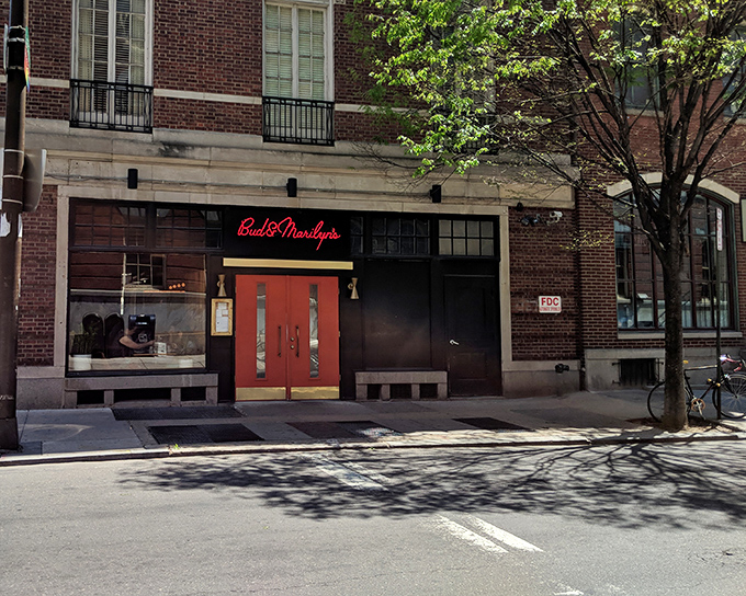 Those bright orange doors aren't just an entrance&mdash;they're a promise of the comfort food paradise waiting inside. Philadelphia's culinary scene at its most inviting.