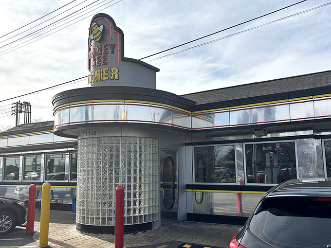 The classic mid-century architecture of Honey Bee Diner stands proudly in Glen Burnie, its cheerful bee logo promising sweet comfort inside.