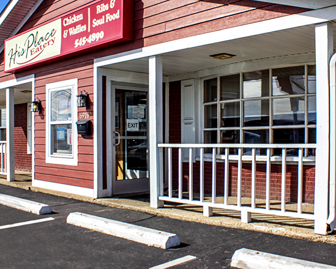 The unassuming red exterior of His Place Eatery might not scream "culinary destination," but your nose will know better the moment you step out of the car.
