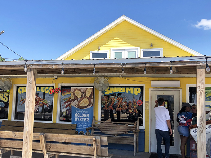 That sunshine-yellow exterior isn't just cheerful&mdash;it's a beacon for seafood lovers, promising Gulf treasures within those unassuming walls.