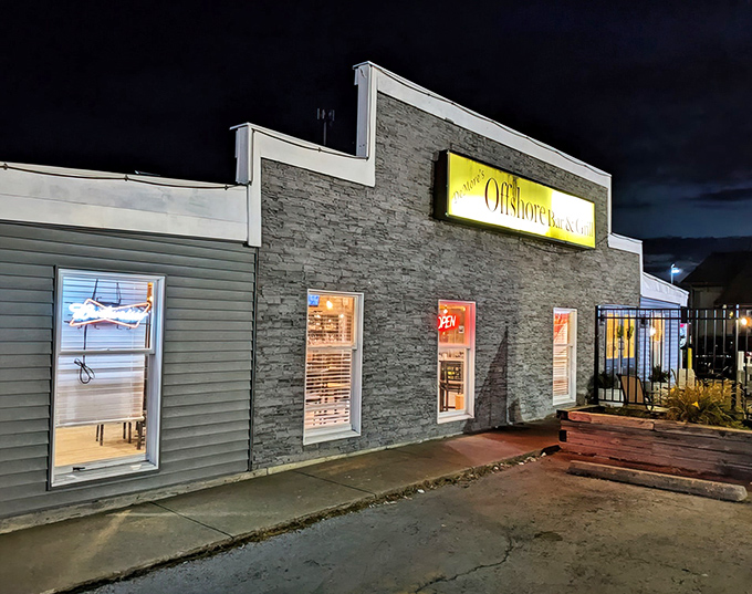 The unassuming stone facade of DeMore's Offshore Bar & Grill stands like a culinary lighthouse on Sandusky's shores, promising seafood treasures within.