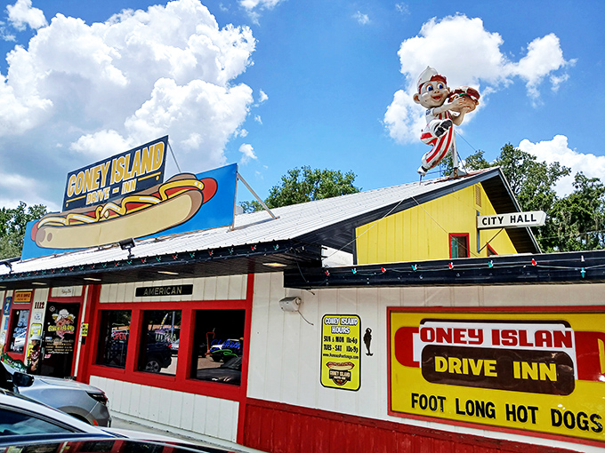 Step inside and you've entered a museum where nostalgia isn't behind glass&mdash;it's plastered on every available surface. The red ceiling adds that perfect diner glow.