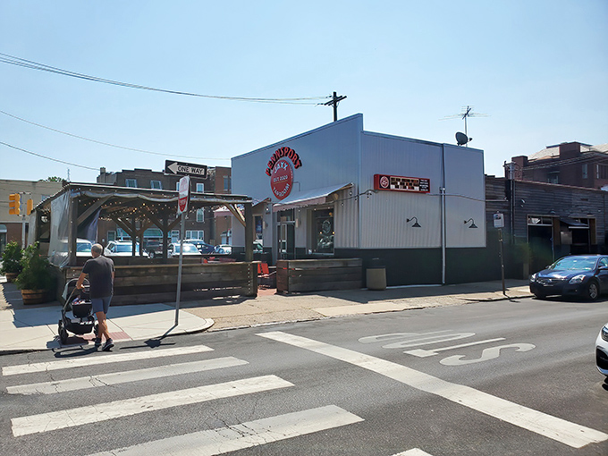 The corrugated metal exterior of Jaxx Taproom isn't trying to impress anyone, which is exactly how the best neighborhood gems operate. Authenticity over flash.