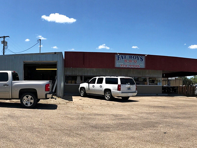 The unassuming exterior of Fat Boy's BBQ in Temple might not win architectural awards, but that smoky aroma wafting through the parking lot tells the real story.