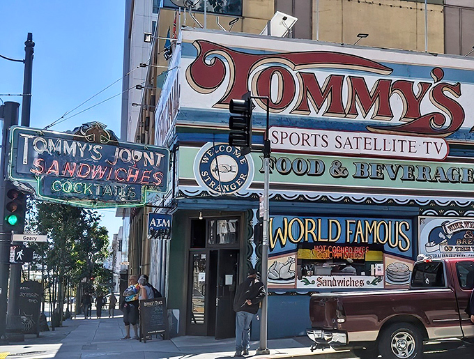 Tommy's Joynt stands like a technicolor fever dream on Van Ness Avenue, a vibrant hofbrau oasis in San Francisco's urban landscape.