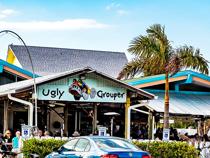 The turquoise-trimmed facade of The Ugly Grouper welcomes visitors with its cartoon mascot grinning from the sign&mdash;Florida casual at its finest.