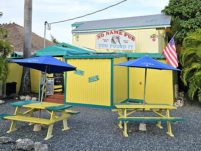 The bright yellow exterior of No Name Pub proudly announces "YOU FOUND IT!" &ndash; a well-earned declaration after navigating the back roads of Big Pine Key.