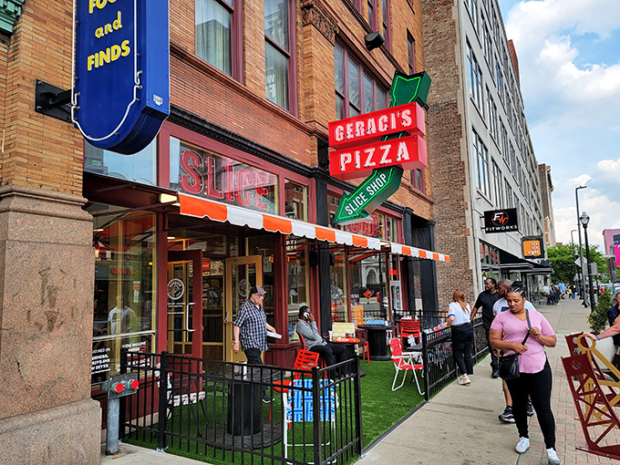 The iconic red and green Geraci's sign beckons pizza pilgrims like a lighthouse for the cheese-obsessed. Downtown Cleveland never smelled so good.