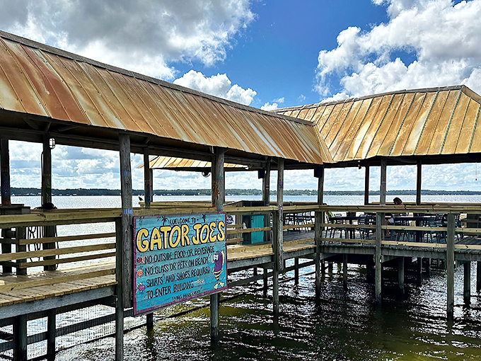 The wooden walkway to Gator Joe's feels like the entrance to a secret Florida treasure &ndash; palm trees standing guard as you approach seafood paradise.