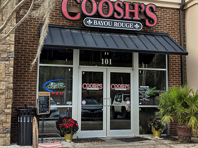The brick façade and bold red signage of Coosh's Bayou Rouge beckons like a siren song to hungry Tallahassee locals seeking Cajun comfort.