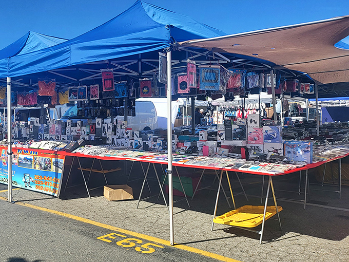 The Paramount Entertainment Center's covered seating area awaits the weekend rush. Soon these benches will host tired shoppers refueling with street tacos and bargain tales.
