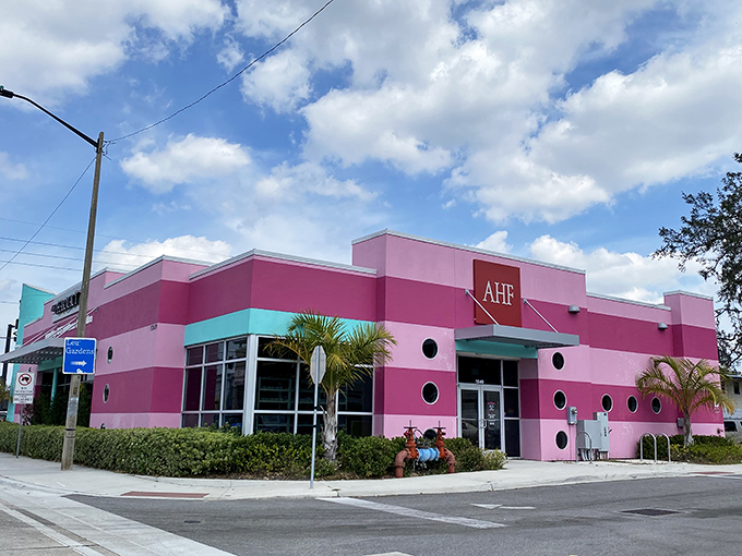 The unmistakable teal and pink exterior of Out of the Closet stands out on Mills Avenue like a flamingo at a business convention.