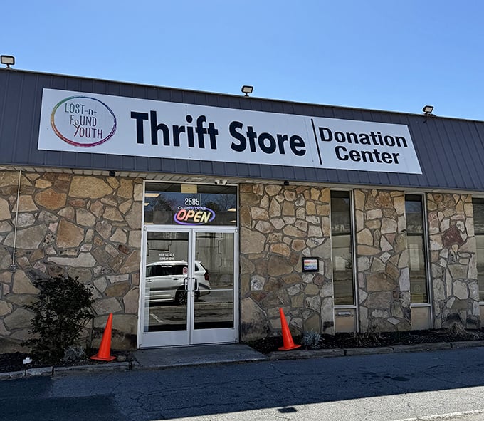 Stone facade meets thrift store magic - where Atlanta's bargain hunters discover their retail promised land.
