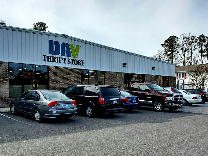 The unassuming exterior of DAV Thrift Store—where bargain hunters' dreams come true and wallets breathe sighs of relief.