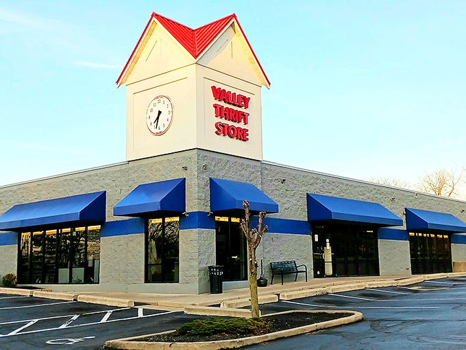 The blue exterior of Valley Thrift Store stands like a beacon of bargain possibilities under Cincinnati skies. Treasure hunting begins here!