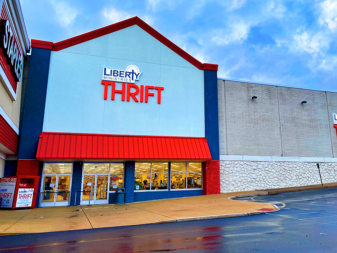 The red-trimmed facade of Liberty Ministries Thrift stands like a beacon of bargain hope in Feasterville-Trevose, promising treasures within that won't break the bank.