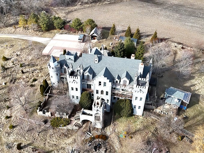 RavenStone Castle rises from the Illinois prairie like a medieval mirage, its stone towers and crenellations defying both geography and expectations.