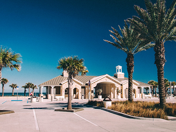 Art deco dreams come alive on Granada Boulevard, where palm trees stand guard over buildings that look like they've been plucked from a Wes Anderson film.