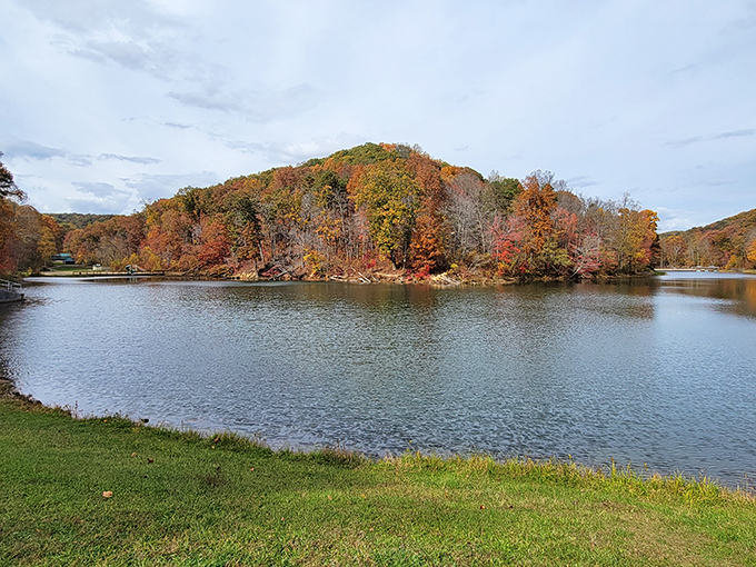 Nature's own masterpiece – Pine Lake reflects autumn's fiery palette like a mirror specially designed for showcasing Ohio's seasonal wardrobe change.