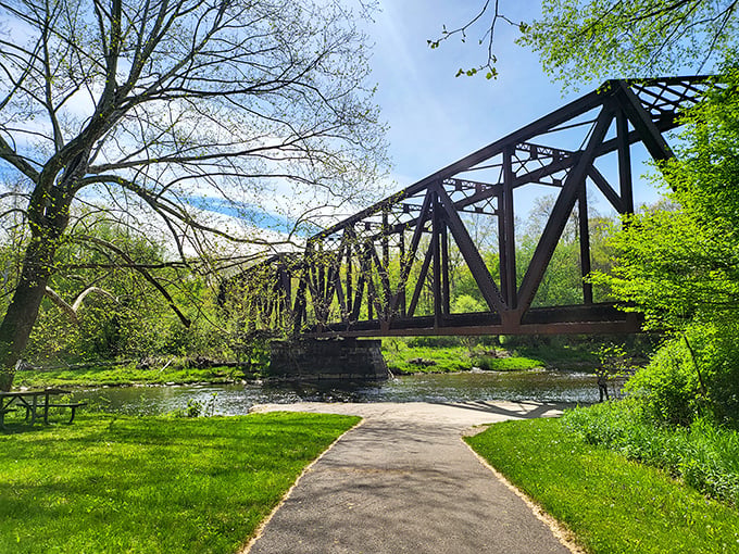 Historic iron bridges span Oil Creek, offering both passage and perspective on this waterway that changed world history.