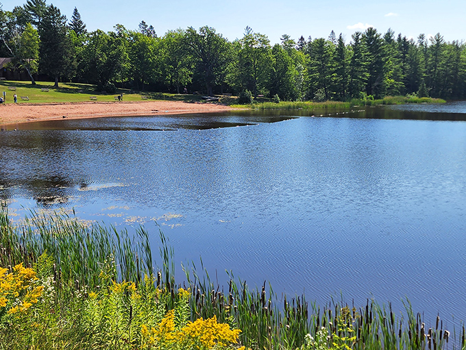 The Black River carves its ancient path through billion-year-old volcanic rock, creating a serene swimming hole that beckons on hot summer days.