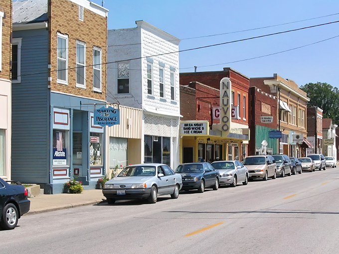 Historic brick buildings line Nauvoo's main street, where 19th-century architecture meets small-town charm in a scene straight from a Hallmark movie.