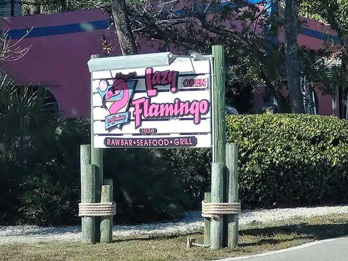 The pink fence and cartoon flamingo aren't just decoration&mdash;they're a promise of the unpretentious island joy waiting inside this Sanibel treasure.