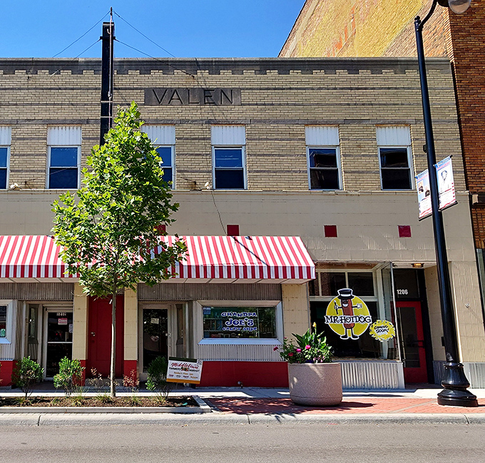 The classic red and white awning and vintage neon sign of Grandpa Joe's beckons like a sugar-coated time machine on Middletown's main drag.