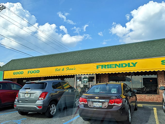 That bright yellow awning isn't just a sign&mdash;it's a beacon of breakfast hope promising "Good Food" and "Friendly" service. Truth in advertising at its finest. 