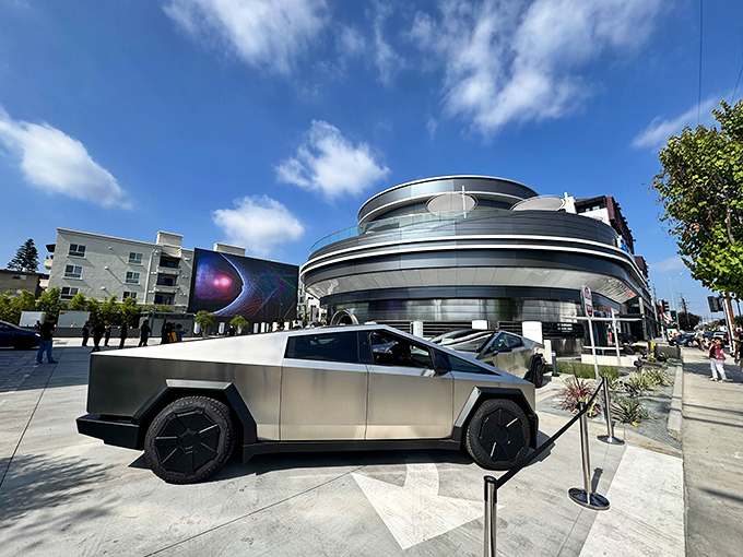 The Tesla Diner's gleaming exterior looks like a spaceship that landed in Los Angeles and decided to serve burgers instead of abducting cows. 