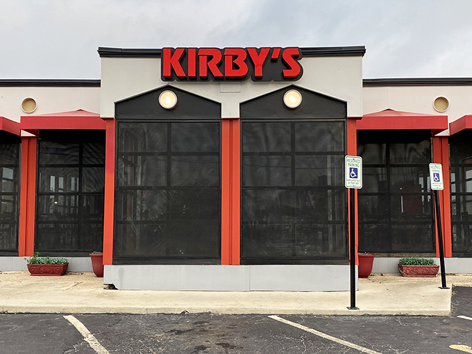 The red-trimmed exterior of Kirby's stands like a burger beacon in Seguin, promising delicious salvation for the hungry traveler.