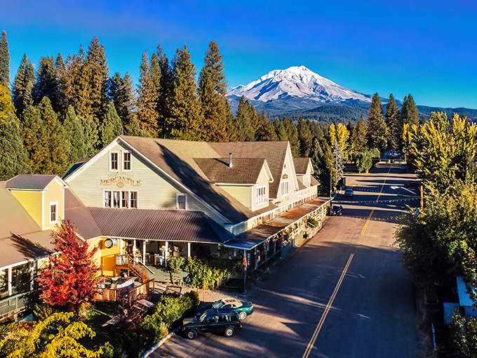 Mount Shasta stands sentinel over McCloud's historic downtown, where fall foliage frames buildings that have witnessed a century of small-town stories.