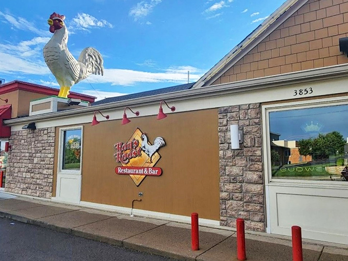 The legendary rooster stands guard atop Ron's Roost, a beacon of comfort food that's been clucking Cincinnati's language of deliciousness for generations.