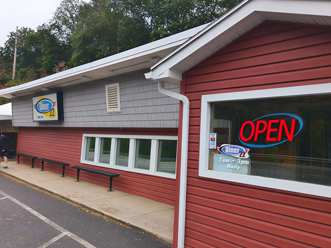 The classic red siding of Diner 22 stands as a beacon of hope for hungry travelers &ndash; proof that sometimes the best meals hide in plain sight.