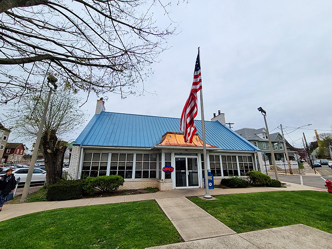 The blue-roofed beacon of breakfast hope stands proudly on Bloomsburg's street corner, promising comfort food salvation to hungry travelers and locals alike.