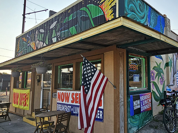 The Green Lantern's vibrant exterior mural and American flag welcome you like an old friend who happens to make killer breakfasts.