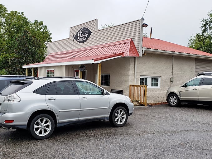 The unassuming exterior of Beacon Light Tea Room beckons hungry travelers with its distinctive fish sign&mdash;proof that culinary treasures often hide in plain sight.
