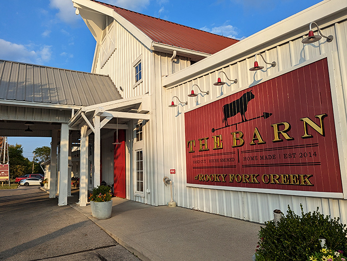 The classic white barn exterior with bold red signage isn't just Instagram-worthy&mdash;it's the architectural equivalent of a warm welcome to your taste buds.