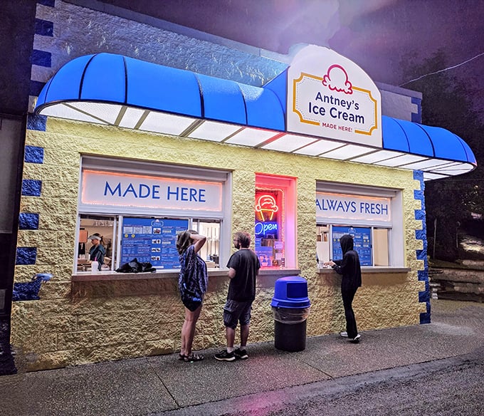 The cheerful yellow building with bright blue accents stands like a beacon of sweet hope in Pittsburgh, promising handcrafted frozen delights.