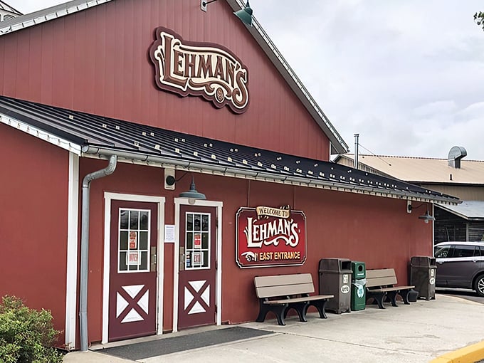 The iconic red barn exterior of Lehman's stands proudly against an Ohio sky, promising treasures of simpler times within its walls.