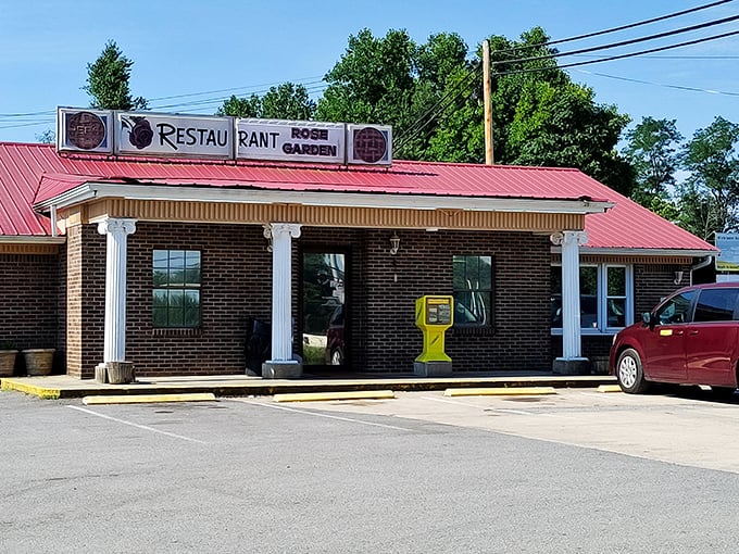 The unassuming brick exterior with its cheerful red roof promises no frills, just honest-to-goodness Tennessee cooking that'll make your soul smile.