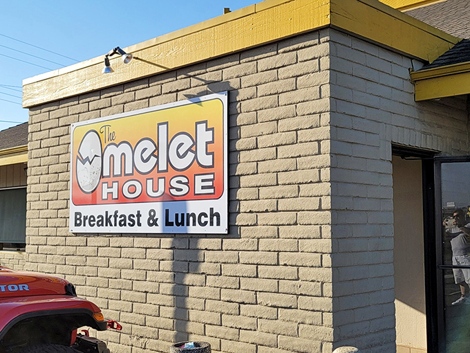 The unassuming exterior of Omelet House proves once again that California's best breakfast treasures often hide behind modest facades. Yellow trim promises sunny experiences inside.